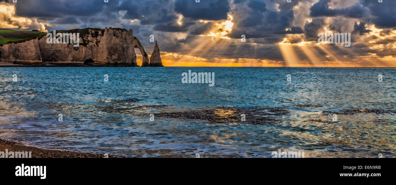 Colorful sunset at Etretat in the Upper Normandy in the North of France ...