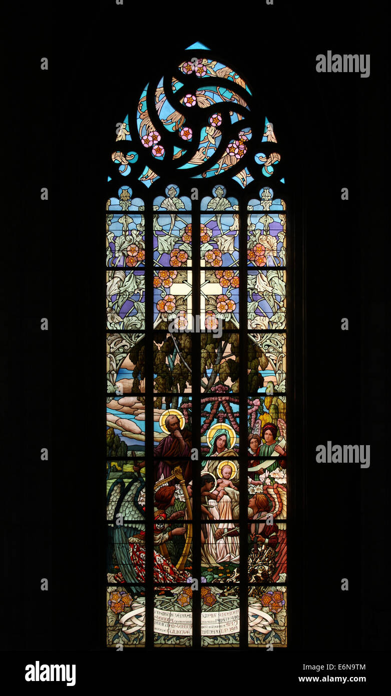 The Holy Family. Stained glass window in Saint Barbara's Church in ...