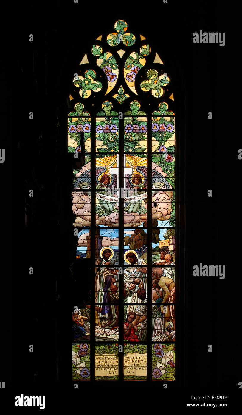 Jesus Christ as the Healer of the World. Stained glass window in Saint ...