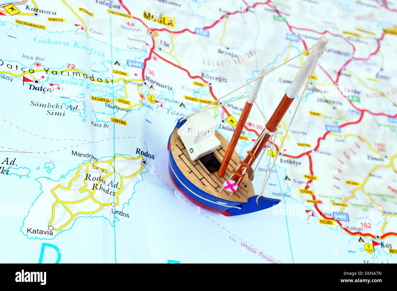 Toy ship on a map. Travelling by ship concept Stock Photo - Alamy