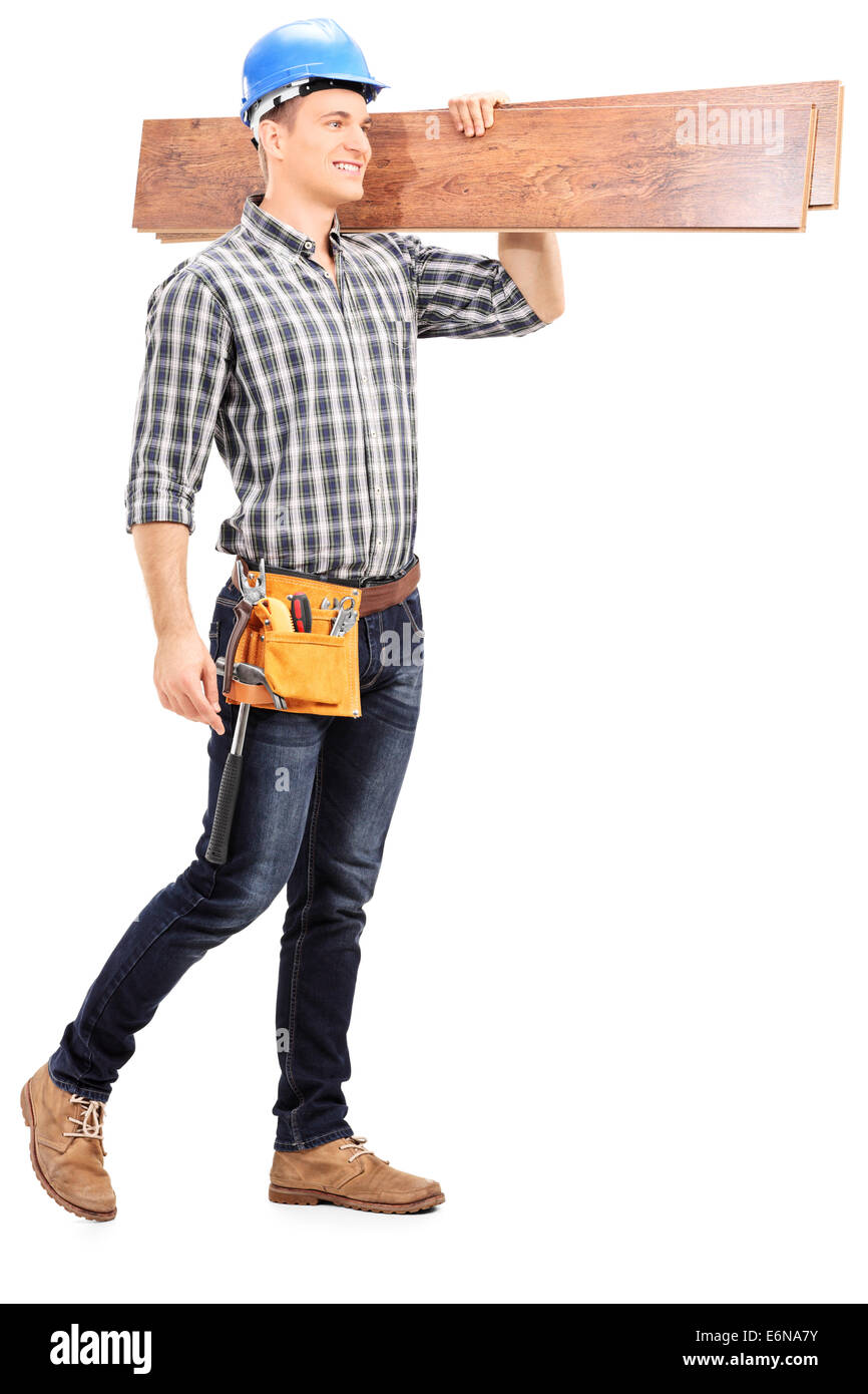 Man carrying planks of wood hi-res stock photography and images - Alamy