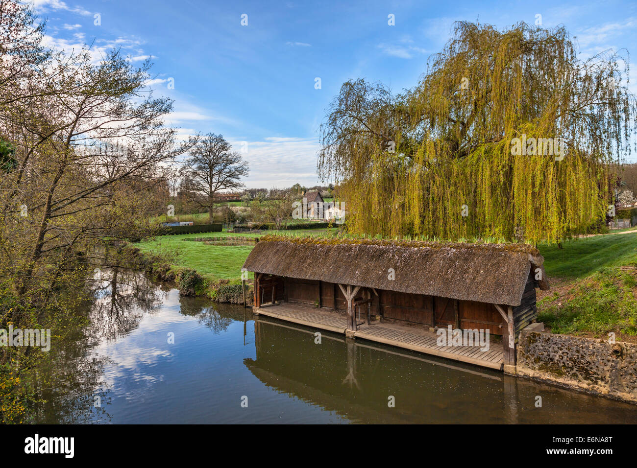 Traditional French wash-house located on the riverside in the Central ...