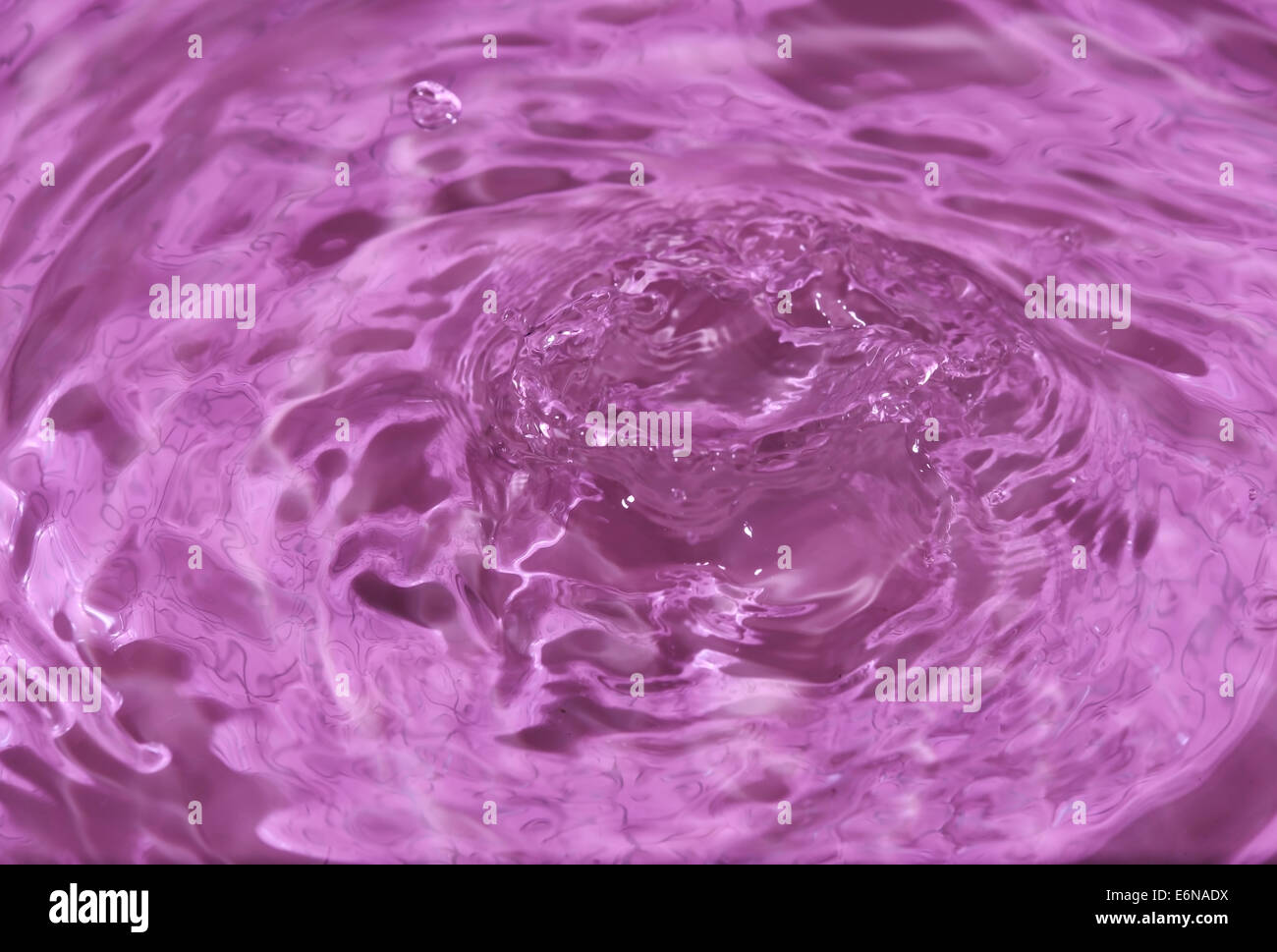 Pink water splash hi-res stock photography and images - Alamy