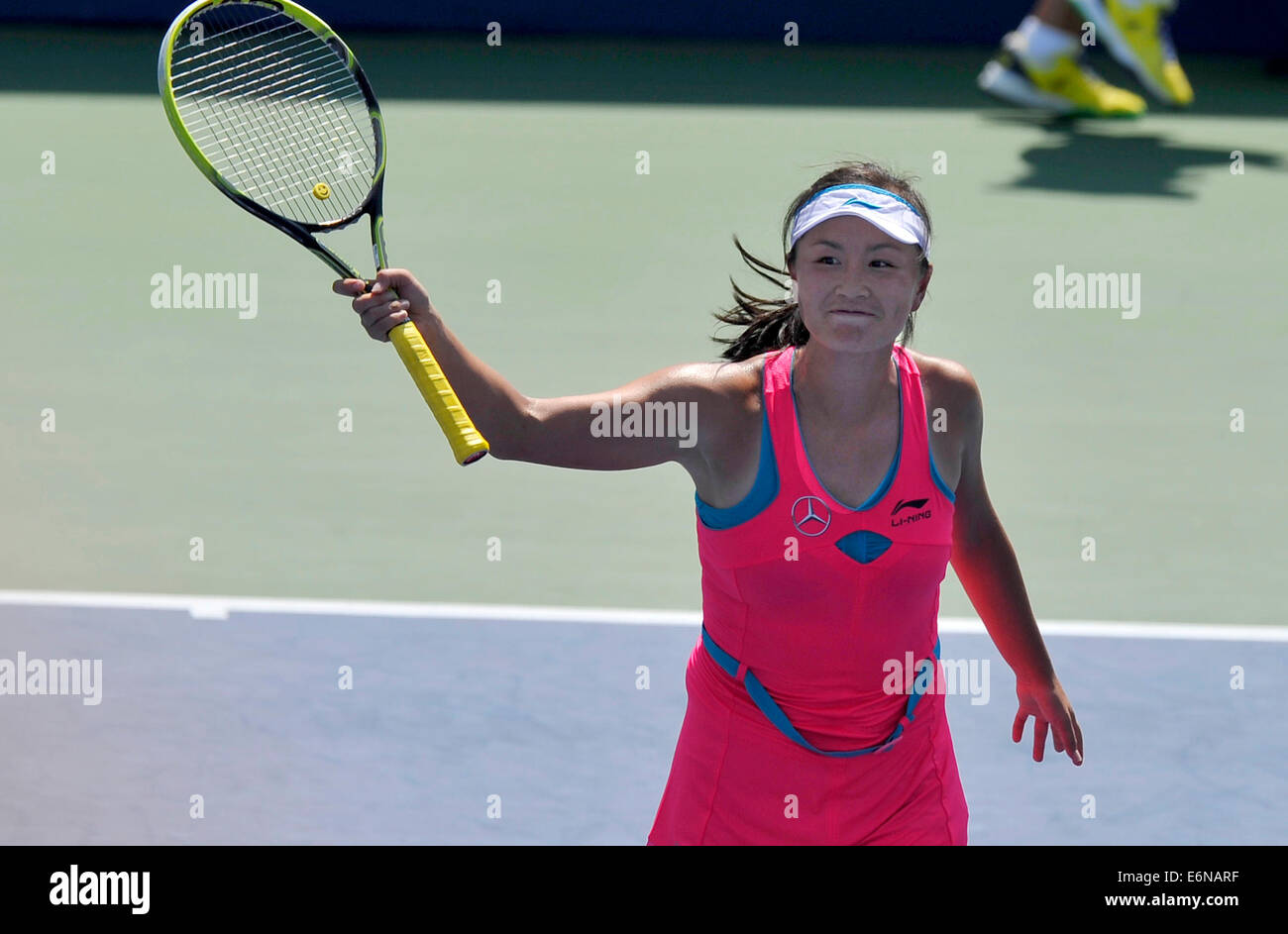 New York, USA. 27th Aug, 2014. Peng Shuai of China waves to the ...