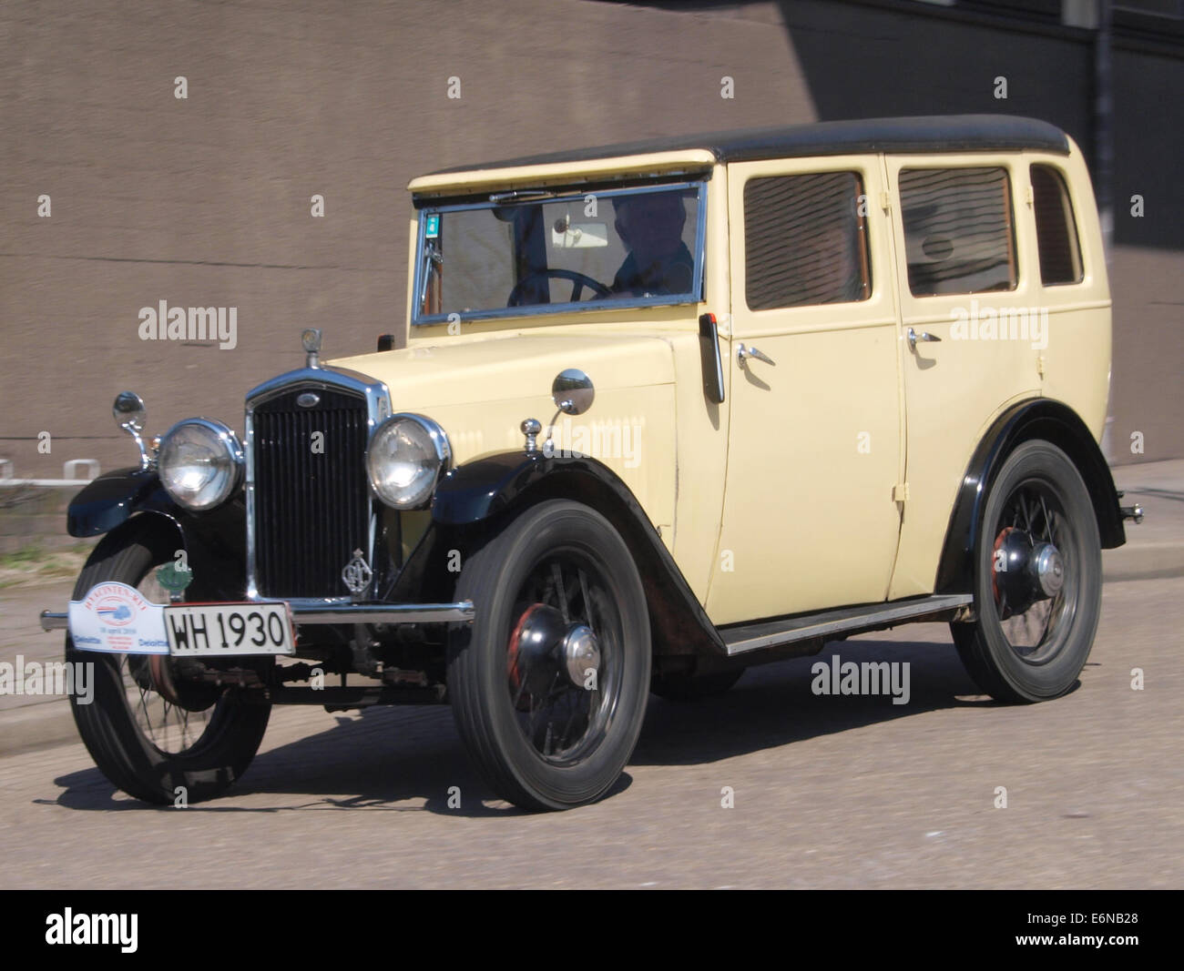 This image features a 1930 Wolseley WH, a luxury automobile produced by ...