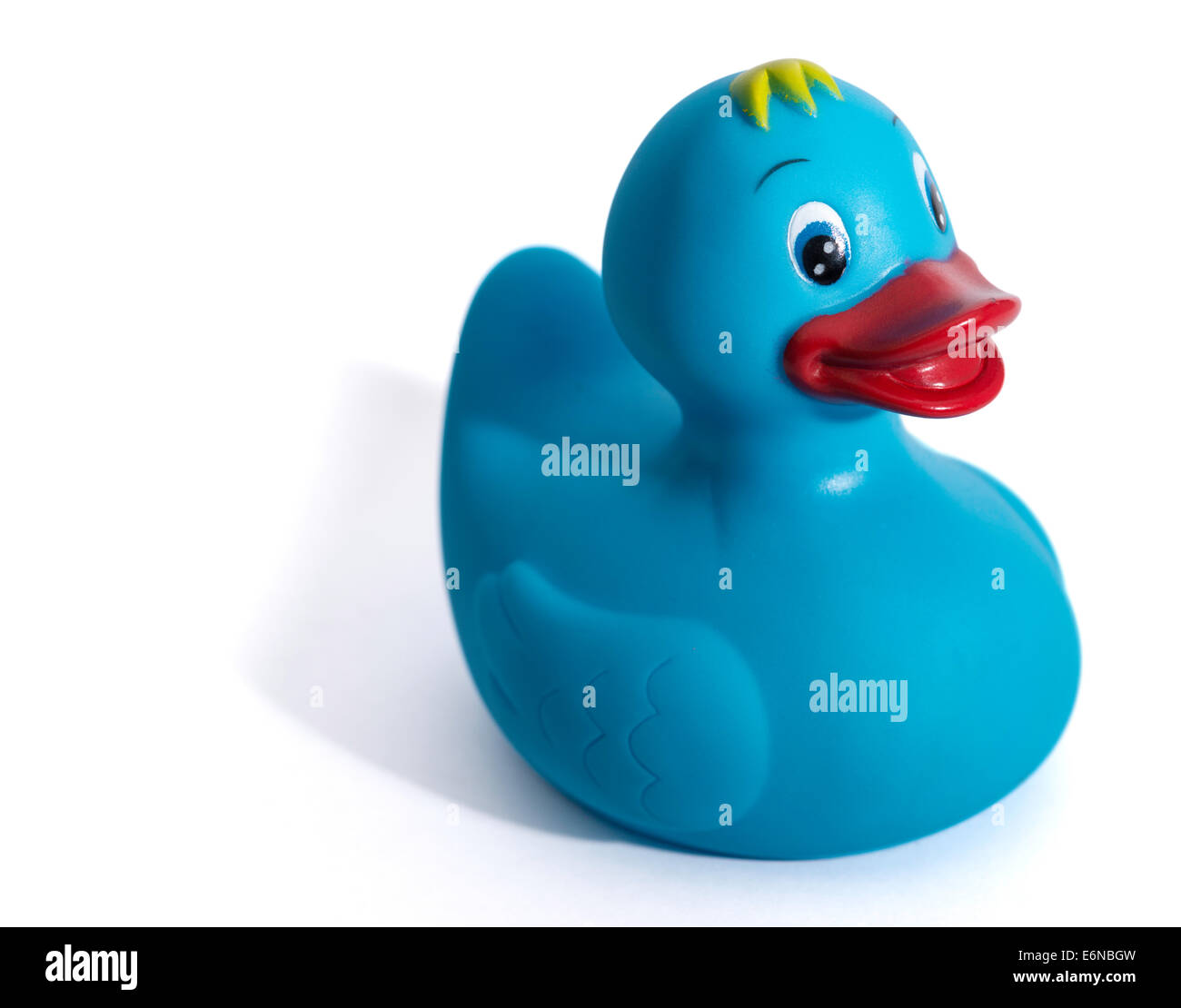 Blue plastic bath toy at an angle isolated against a white background ...