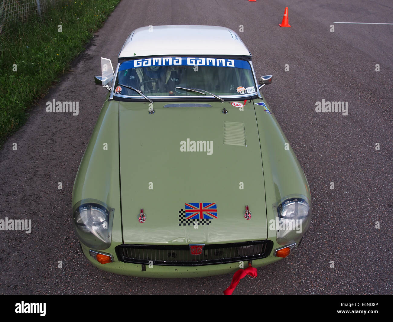 This image captures an MG race car, number 70, at the Zandvoort circuit ...
