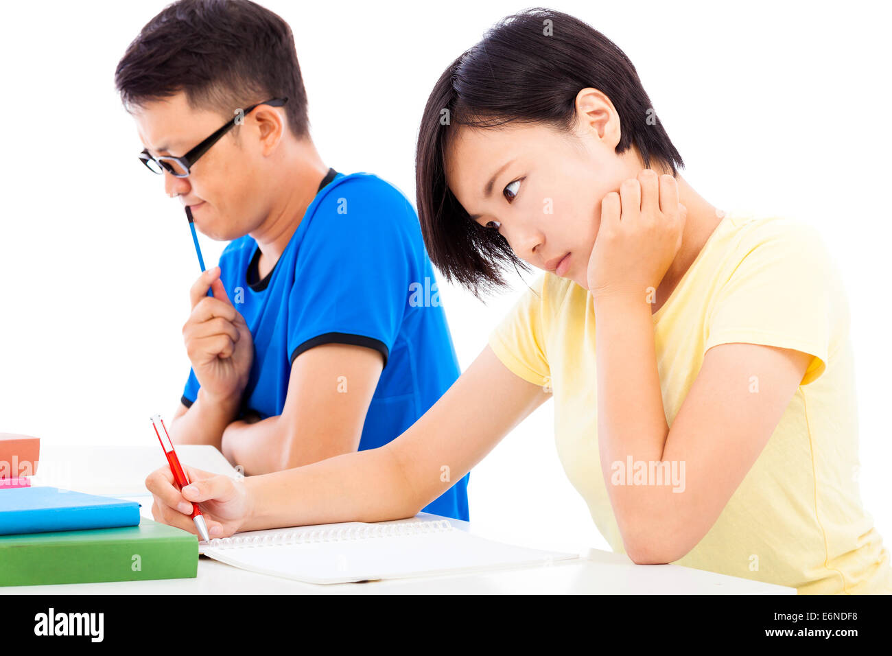 two college students sitting an exam in a classroom Stock Photo - Alamy