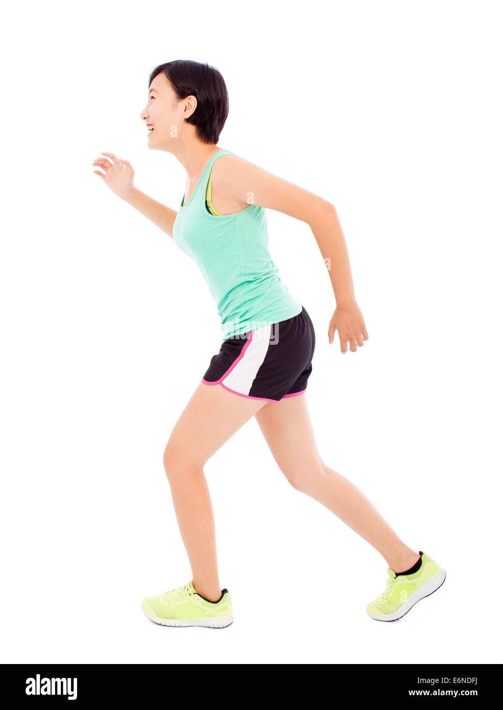 smiling young female runner isolated on white background Stock Photo ...