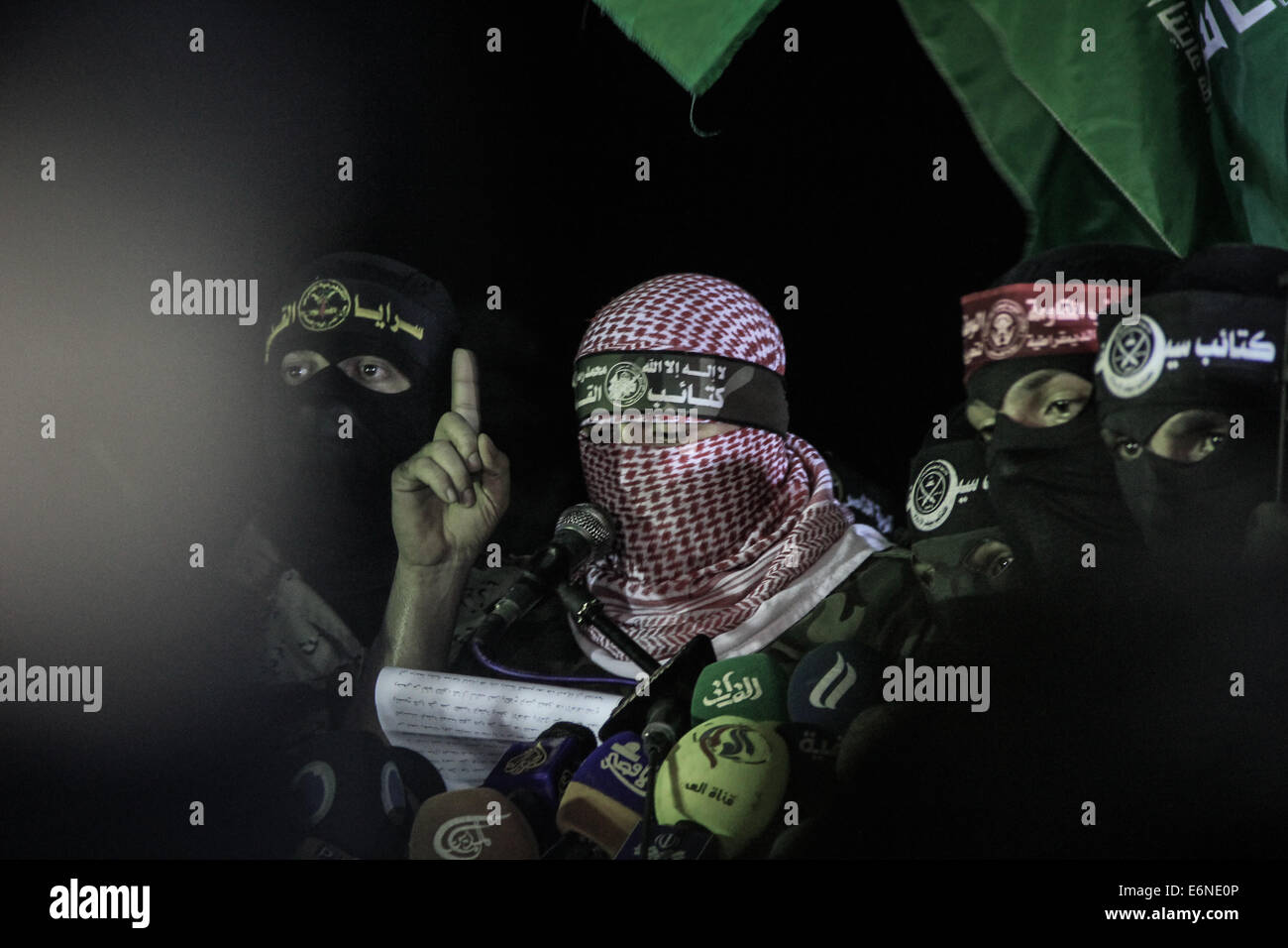 Abu Ubaida speaks in front of Palestinians fighters. Abu Ubaida the ...