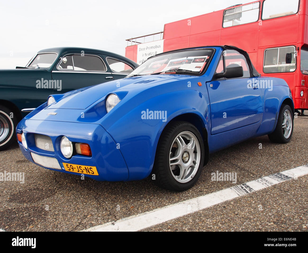 A Midas Kikkeroog Nissan Micra C05, a compact car known for its ...