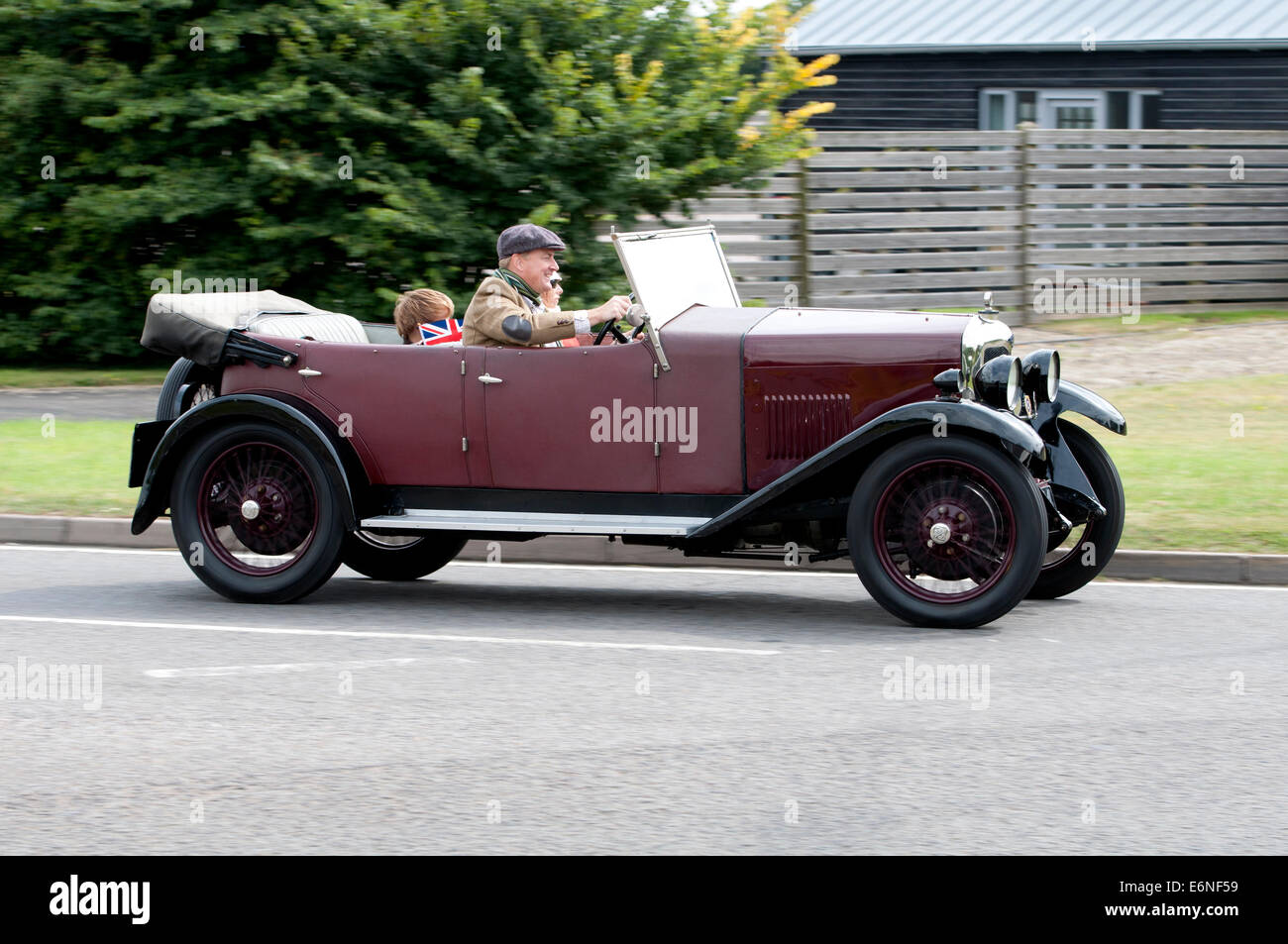Riley Mk IV Fabric Tourer car on the Fosse Way road, Warwickshire, UK ...