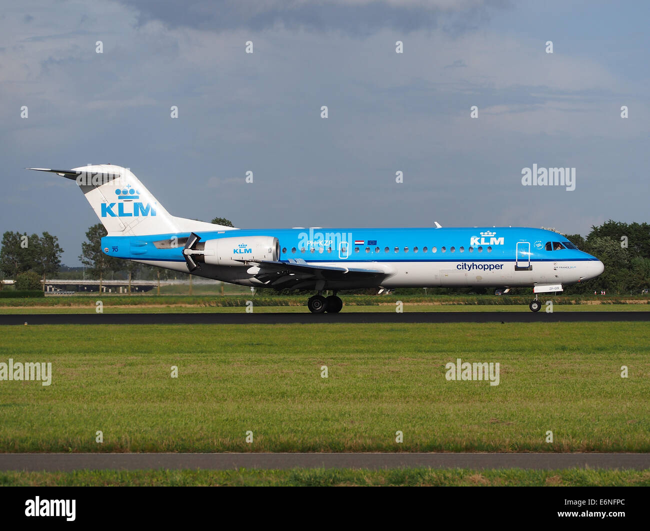 PH-KZP, a KLM Cityhopper Fokker F70, lands at Schiphol Airport in the ...