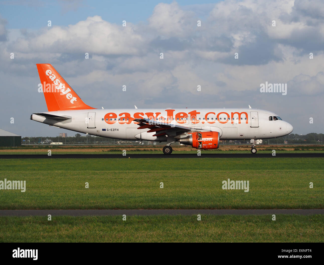 easyJet Airbus A319-111, registration G-EZFH, is captured landing at ...