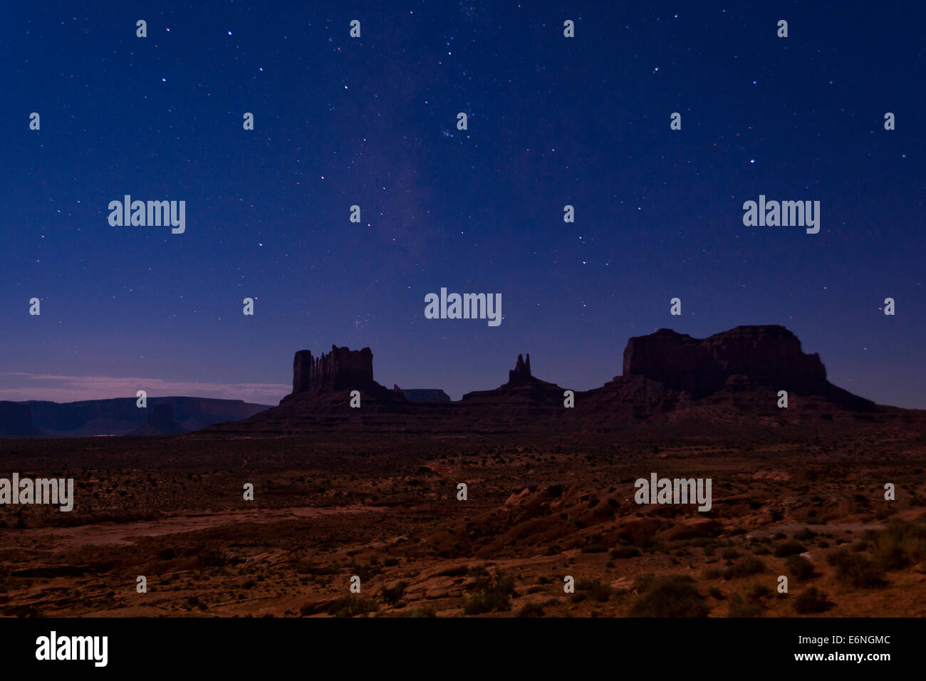 Monument valley under starry night sky - Utah USA Stock Photo - Alamy