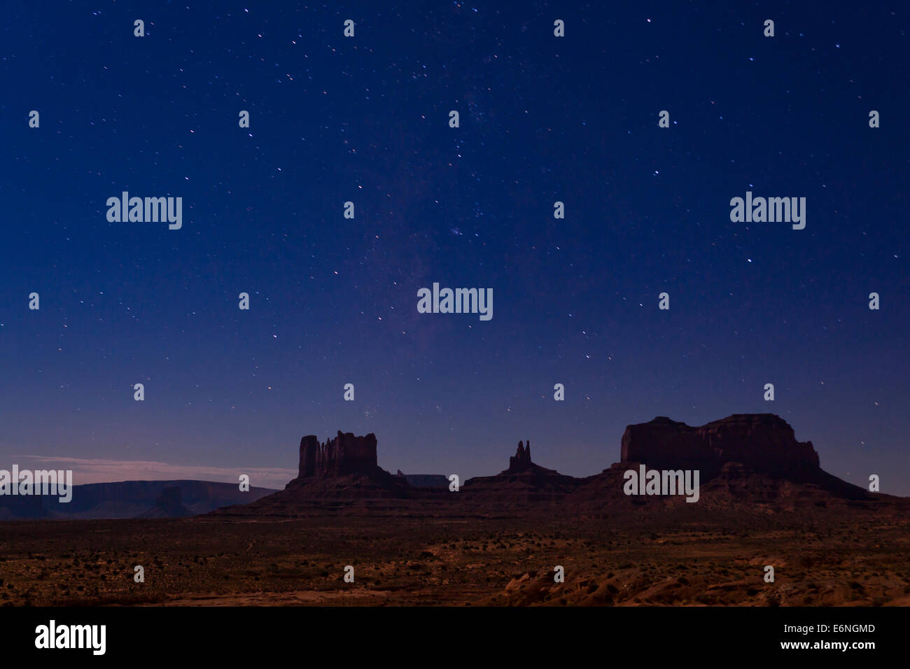 Monument valley under starry night sky - Utah USA Stock Photo - Alamy