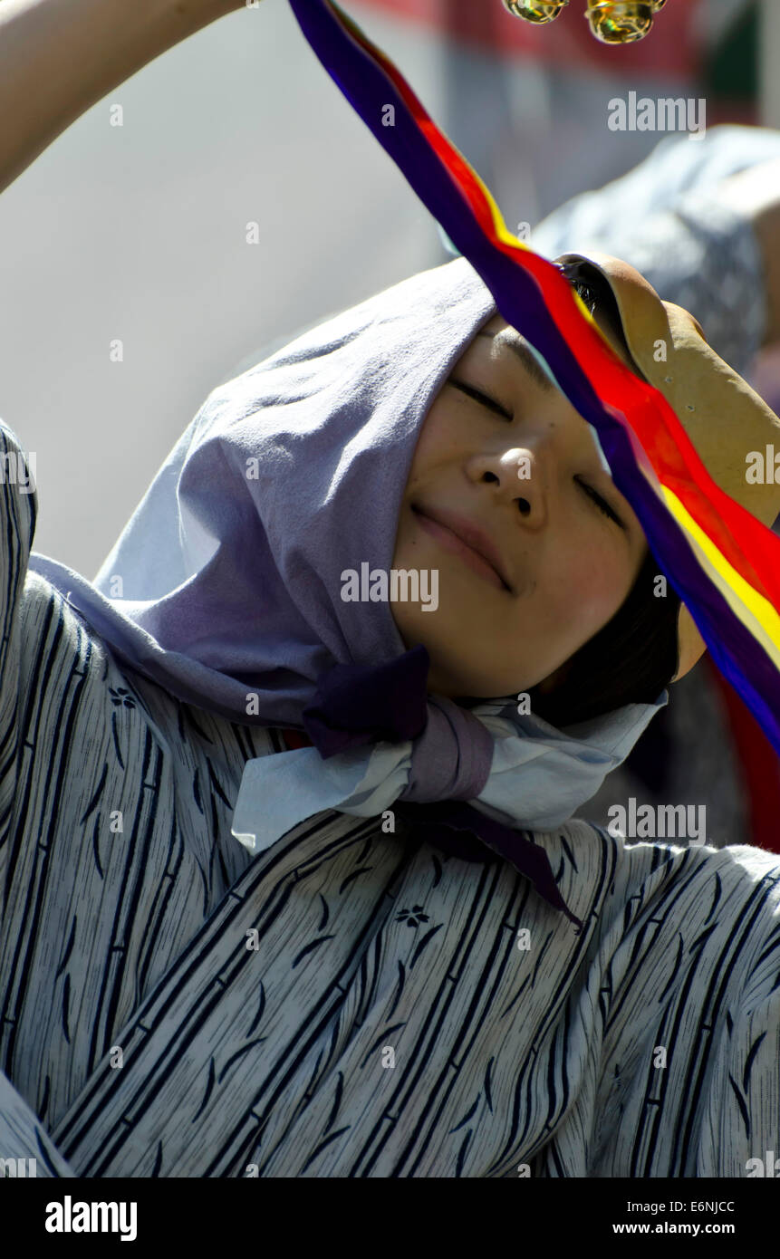 Japanese dancer in a strange costume promoting a show at the annual ...