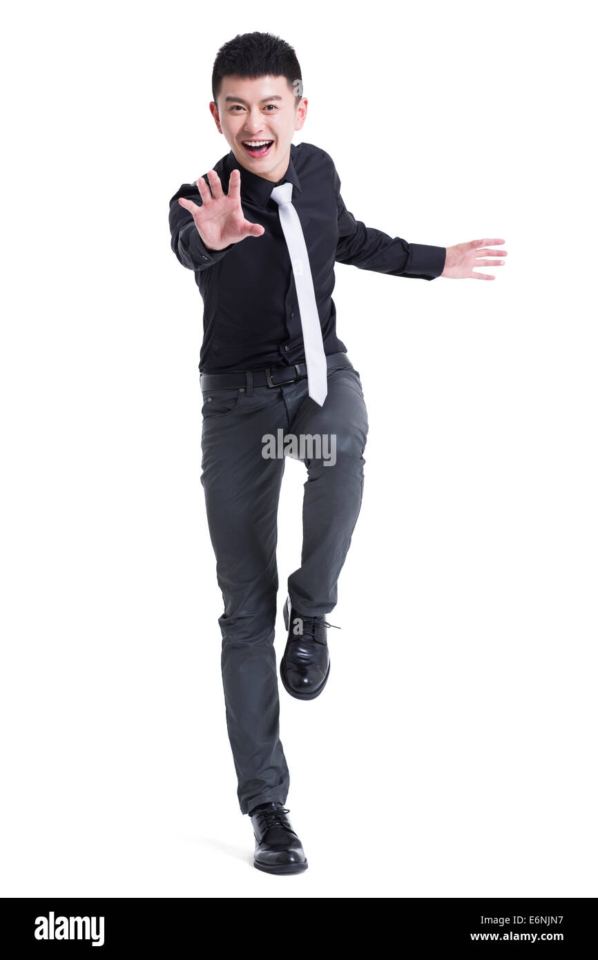 Young man chasing hi-res stock photography and images - Alamy