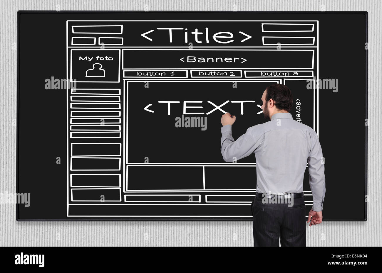 young businessman drawing website on blackboard Stock Photo - Alamy