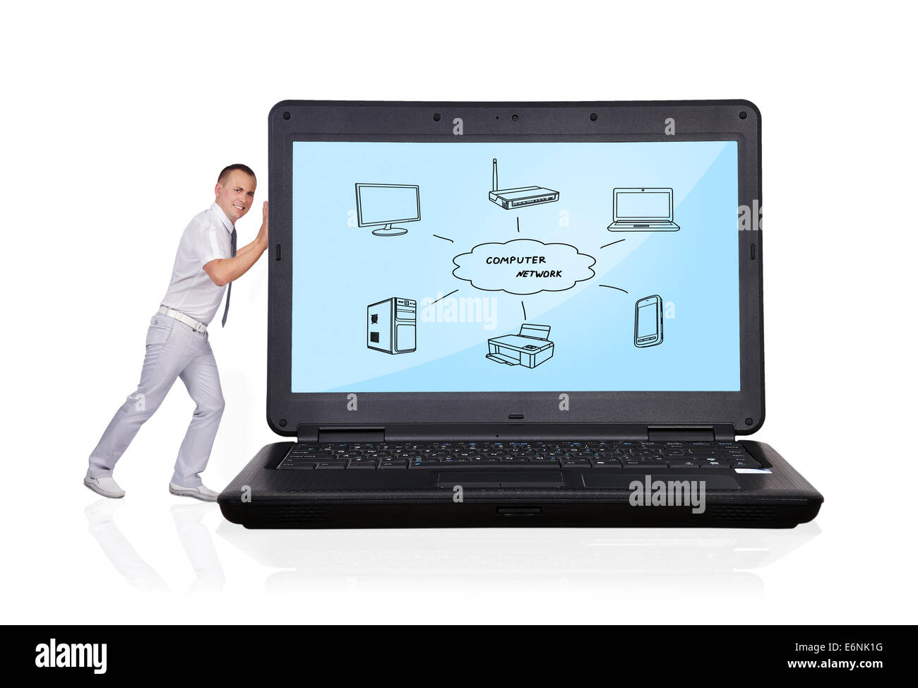 Businessman pushing laptop on a white background Stock Photo - Alamy