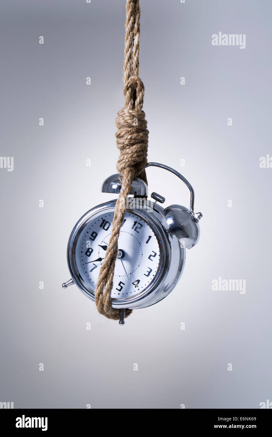 Clock tied hi-res stock photography and images - Alamy