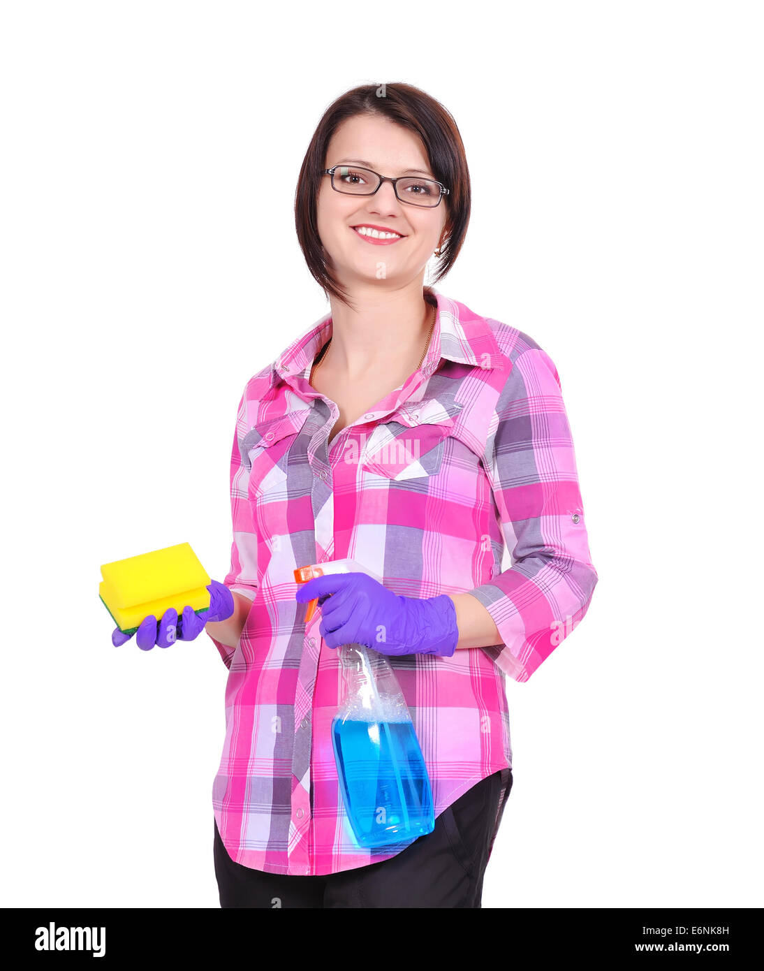 Cleaning girl standing with glass cleaner and wisp Stock Photo - Alamy