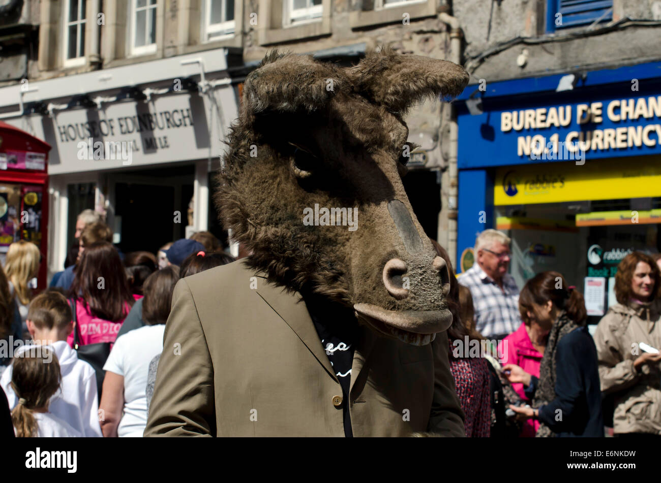 Man wearing a donkey's head (Bottom) promoting a show at the annual ...