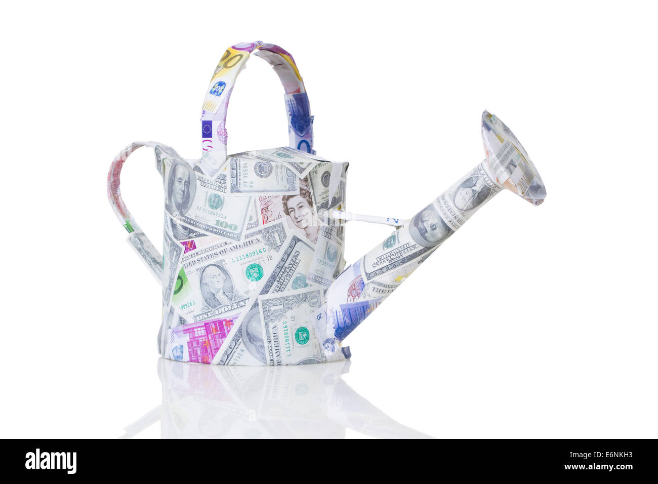 Watering can made from paper currency Stock Photo - Alamy