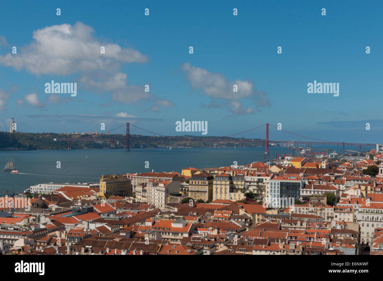 Panorama of old traditional city of Lisbon with red roofs and view of ...