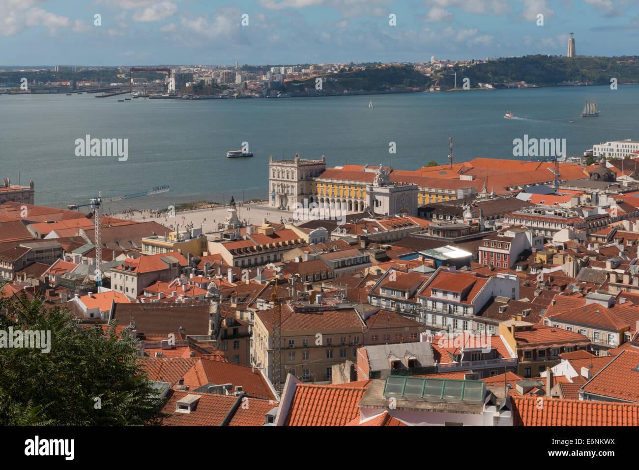 Panorama of old traditional city of Lisbon with red roofs and view of ...