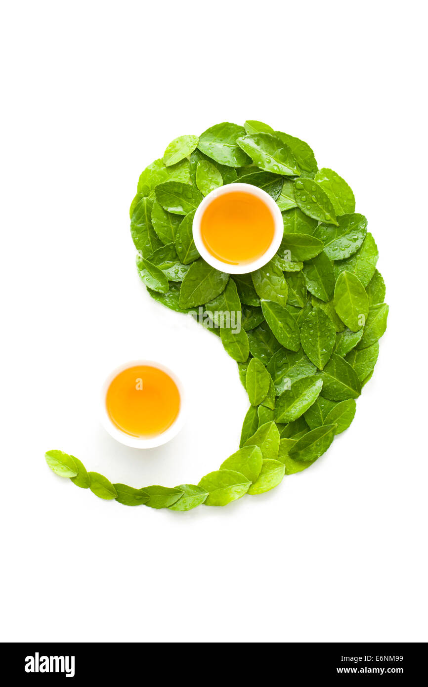 Tea cups and leaves in the shape of Yin Yang Symbol Stock Photo - Alamy