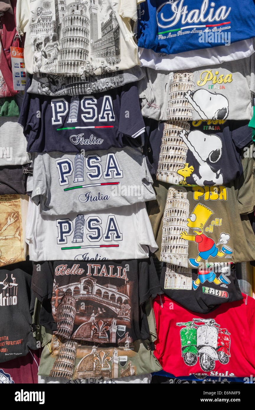 An assortment of tee shirts advertising Pisa and its leaning tower ...