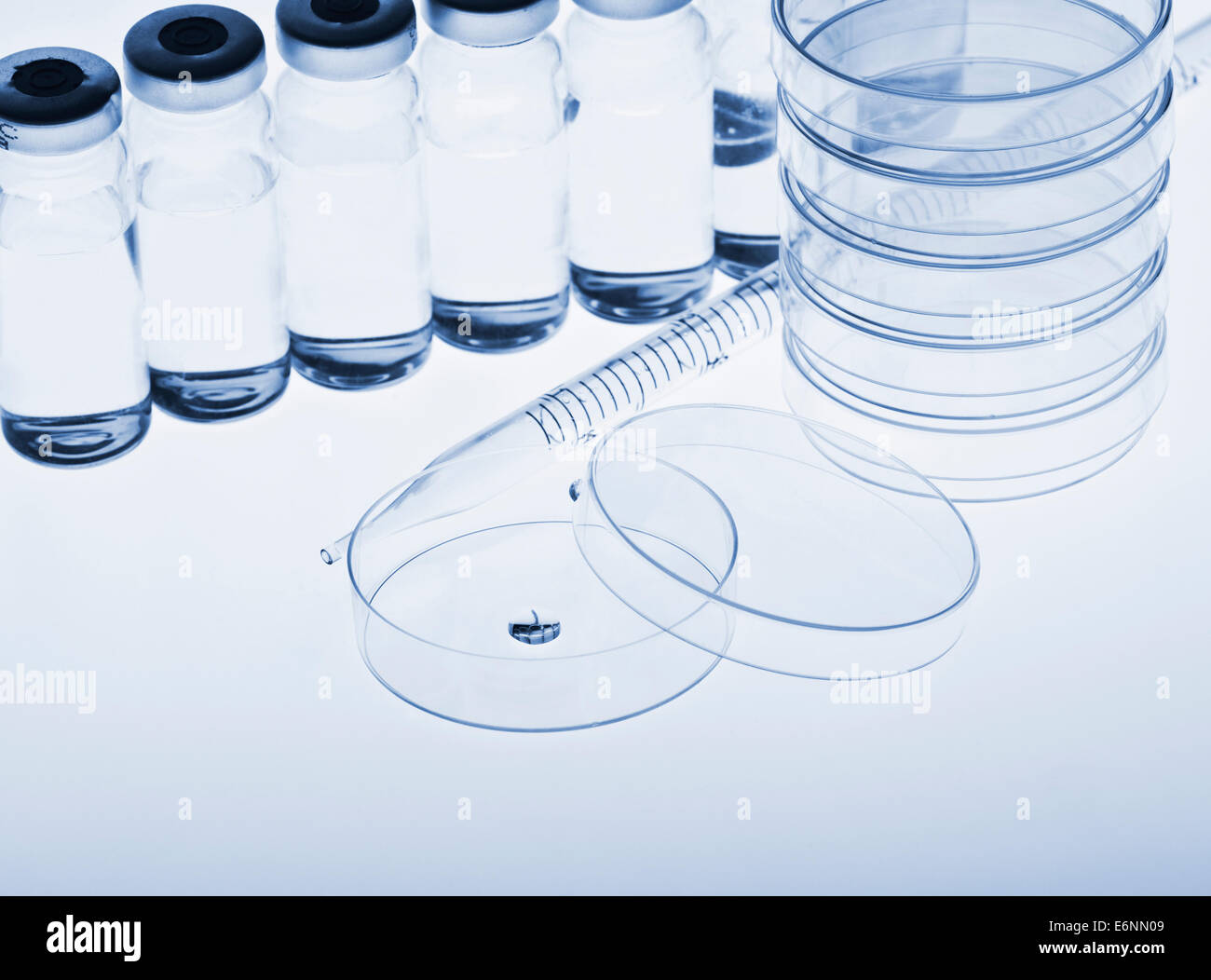 Test-tubes with reflections on a white and blue background. Laboratory ...