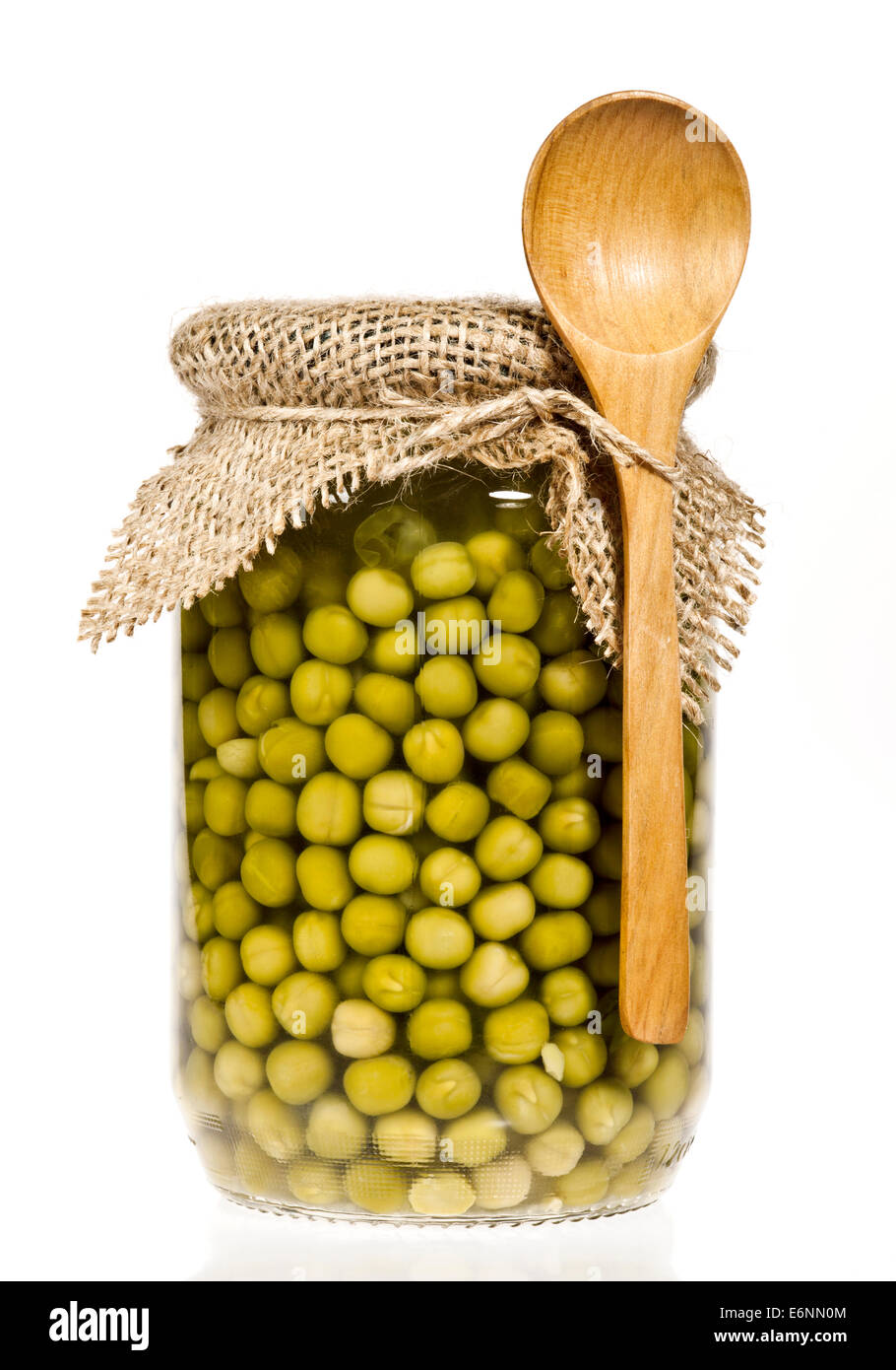 Glass jar of preserved peas on a white background Stock Photo - Alamy