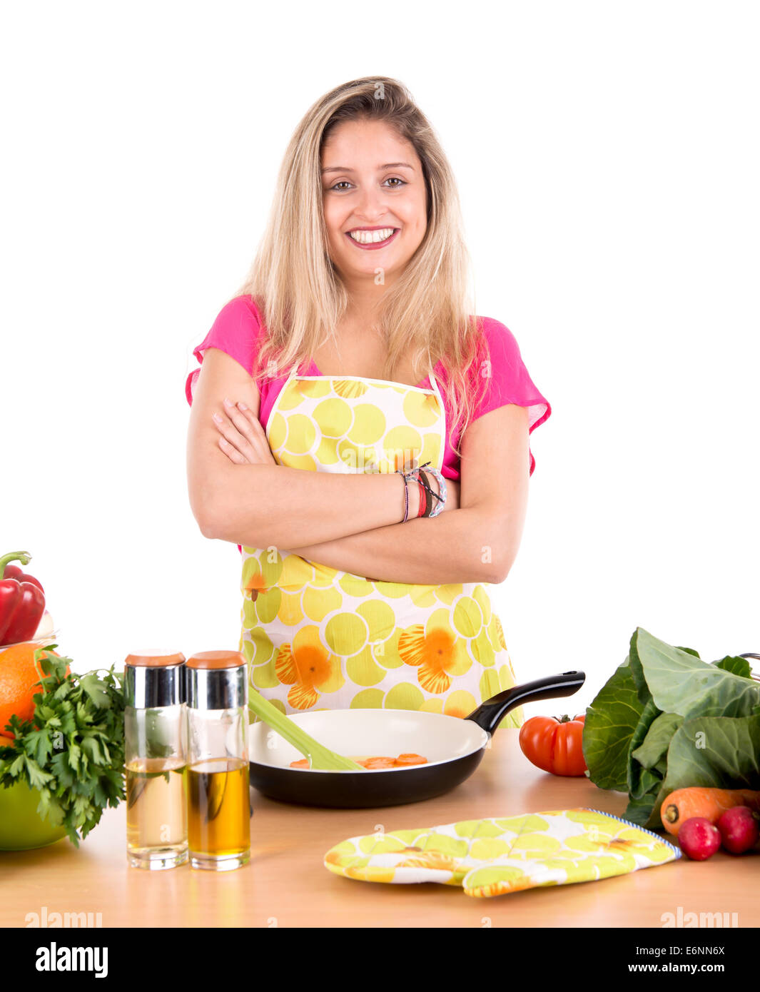 Beautiful woman cooking in the kitchen Stock Photo - Alamy