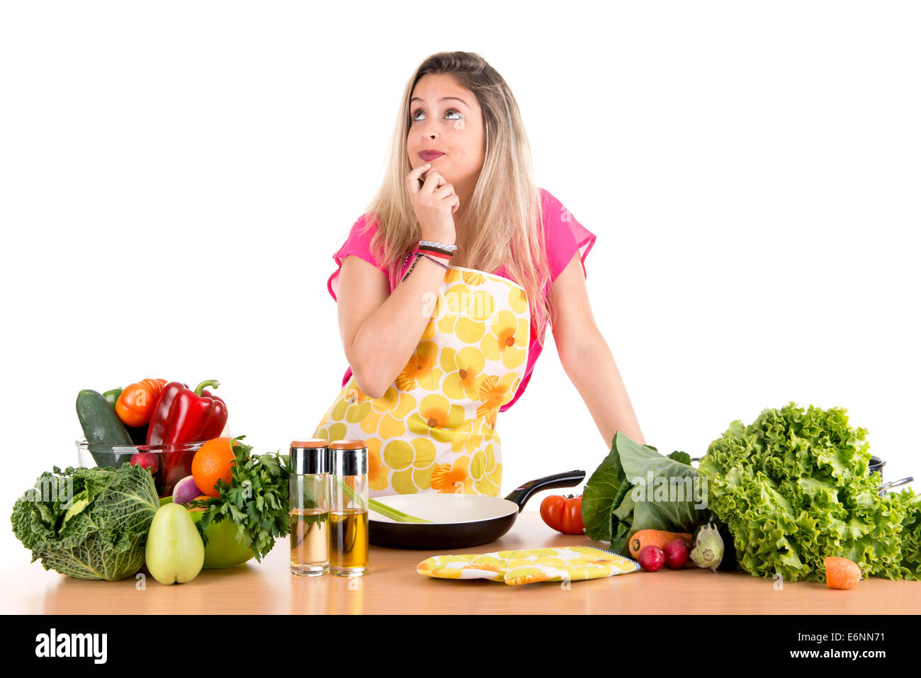Beautiful woman cooking in the kitchen Stock Photo - Alamy