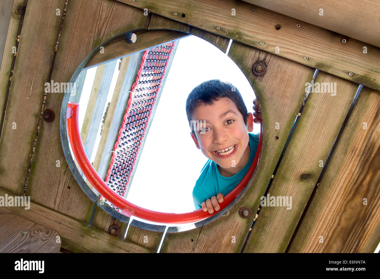 Young boy playing in the park Stock Photo - Alamy