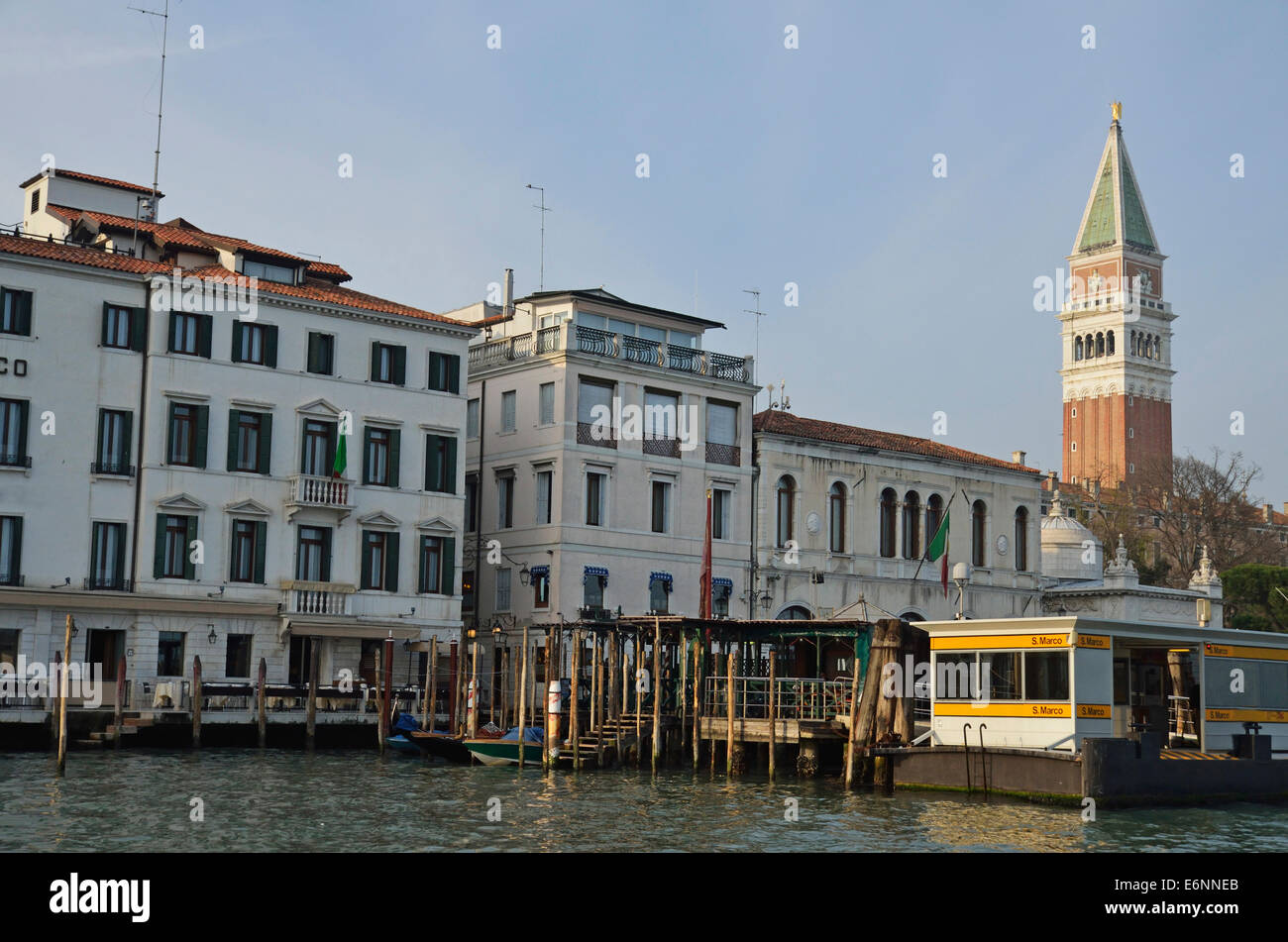 San Marco vaporetto station on Grand Canal with the Bell Tower on St ...