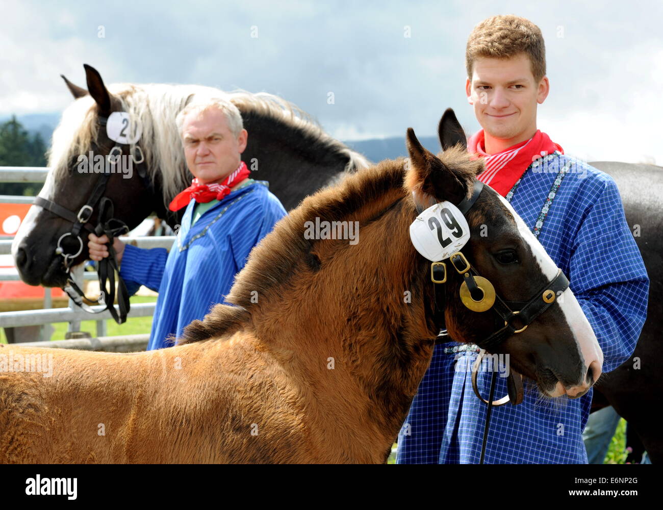 Two participants of the tradtional presentation of foals of Black ...