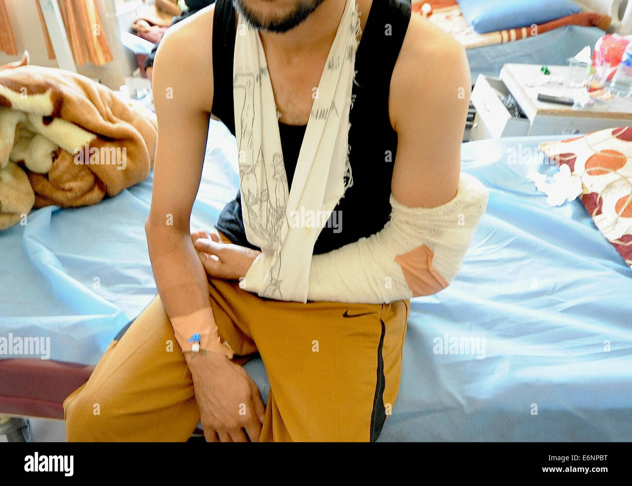 Zakho, Iraq. 28th Aug, 2014. Two displaced men from the Sinjar region ...