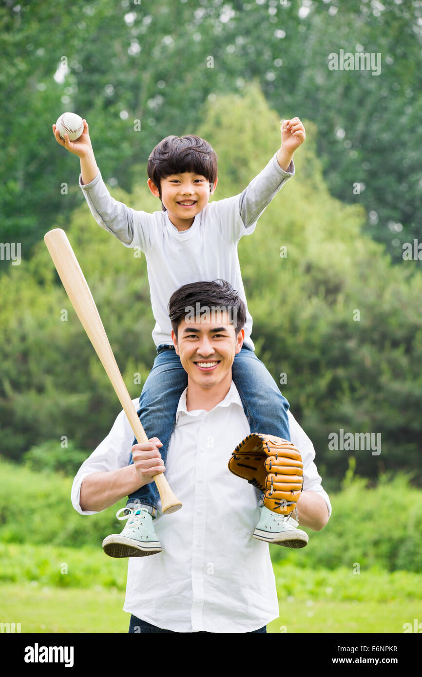 Father and son playing baseball Stock Photo - Alamy