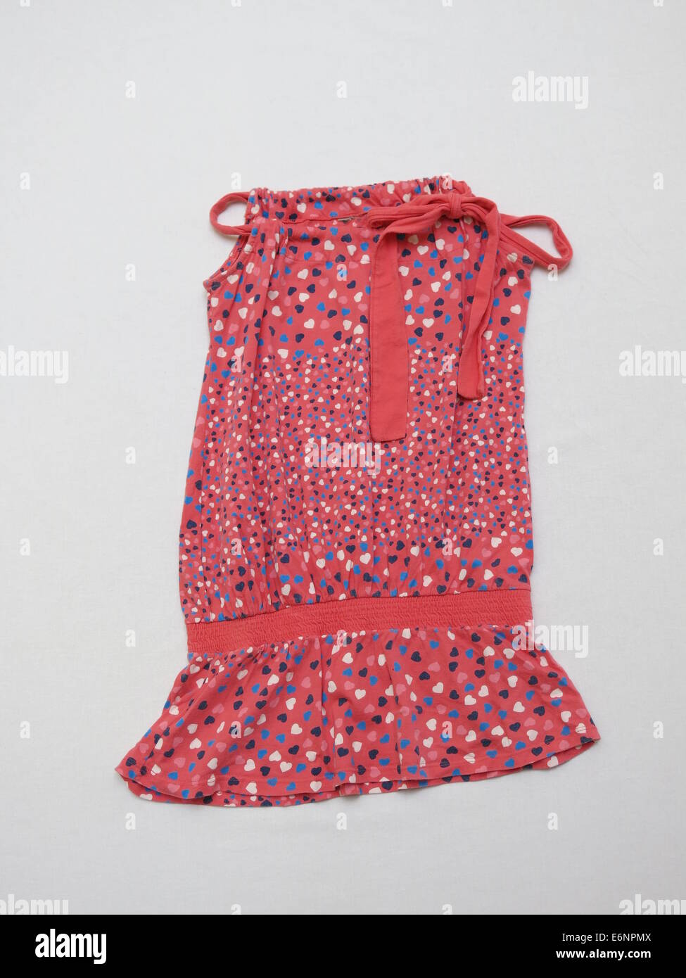 Girl's dress like top isolated against white background Stock Photo - Alamy