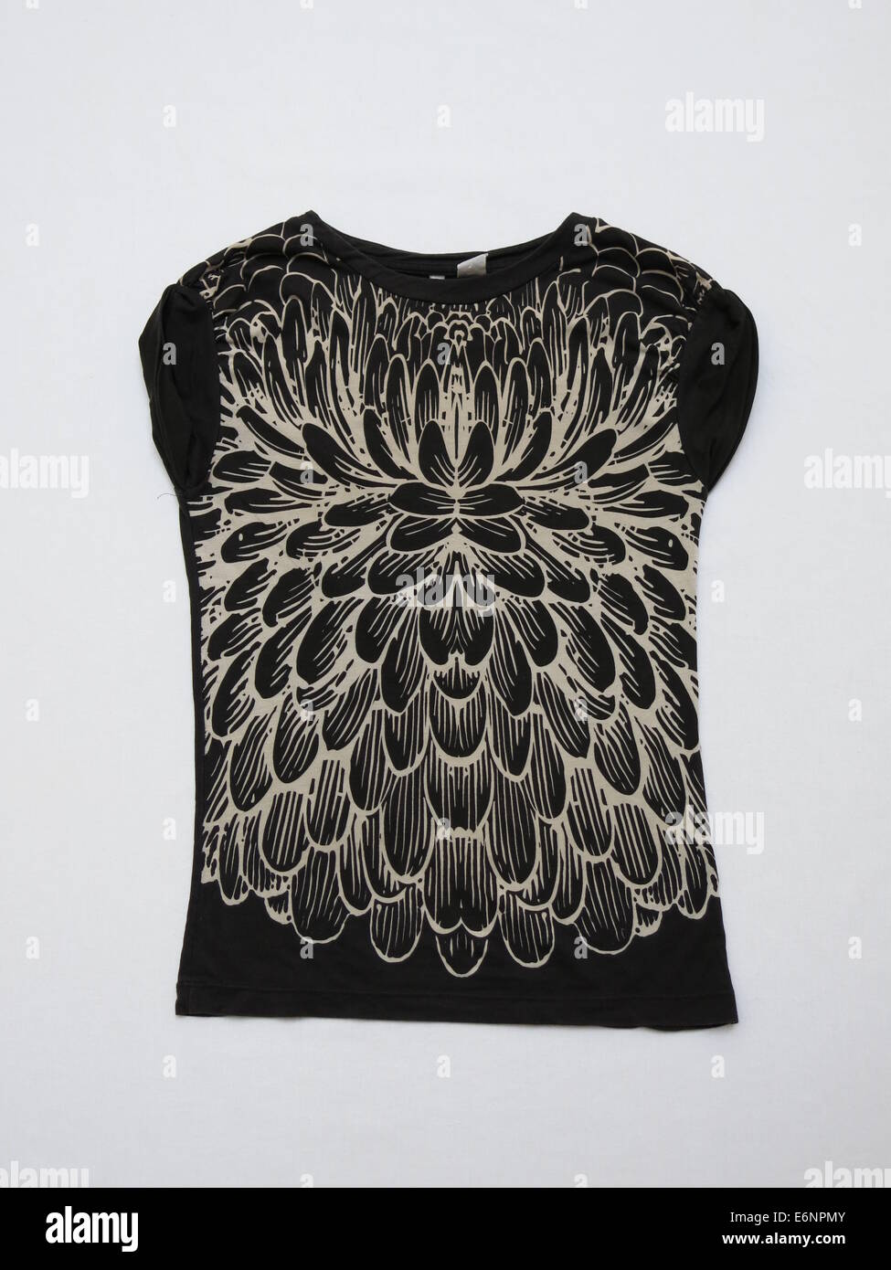 Girl'sblack and white top with a pattern on it isolated against white ...