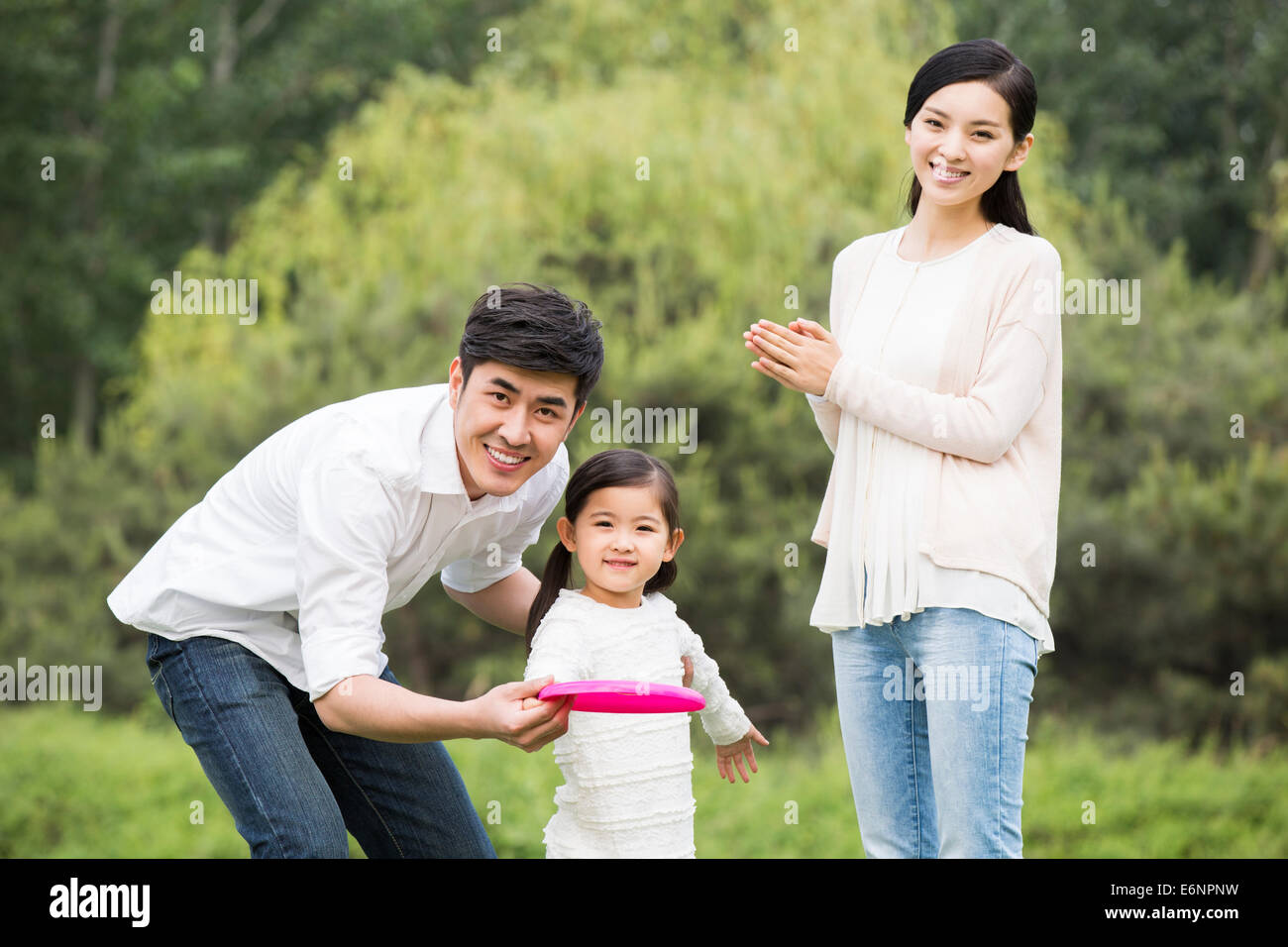 Family playing games Stock Photo - Alamy