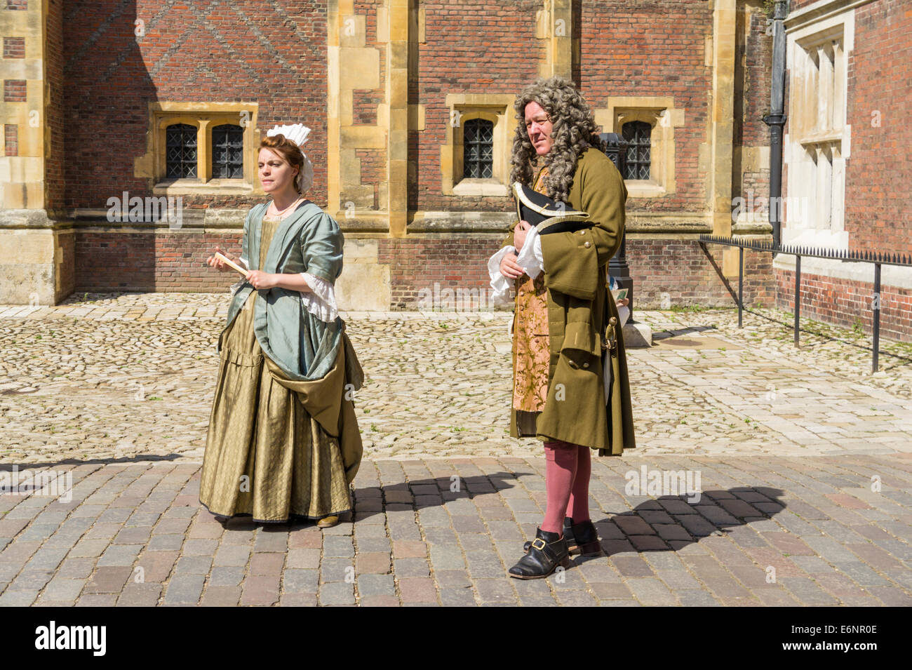 Actors in Historic costume Hampton Court Palace Clock Court London ...