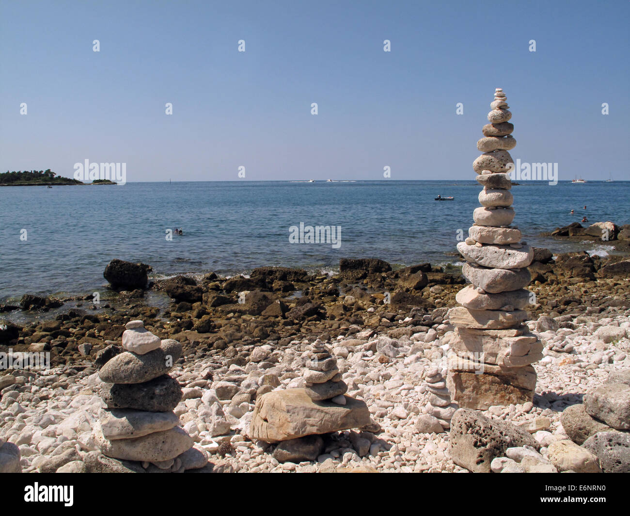 stone sculptures on Istrian beach in Croatia Stock Photo - Alamy