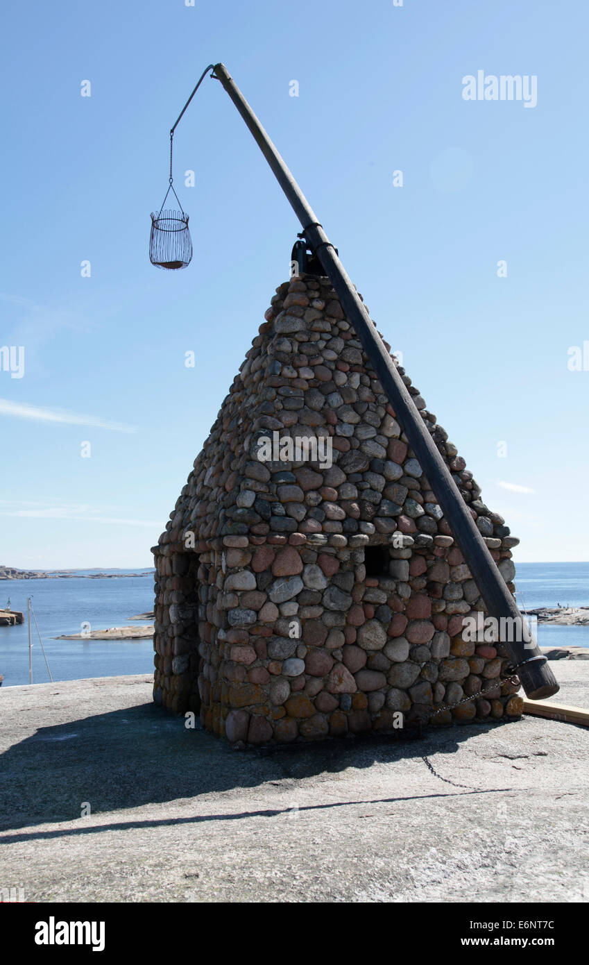 The old lighthouse with fire basket on Verdens Ende. The Norwegian end ...