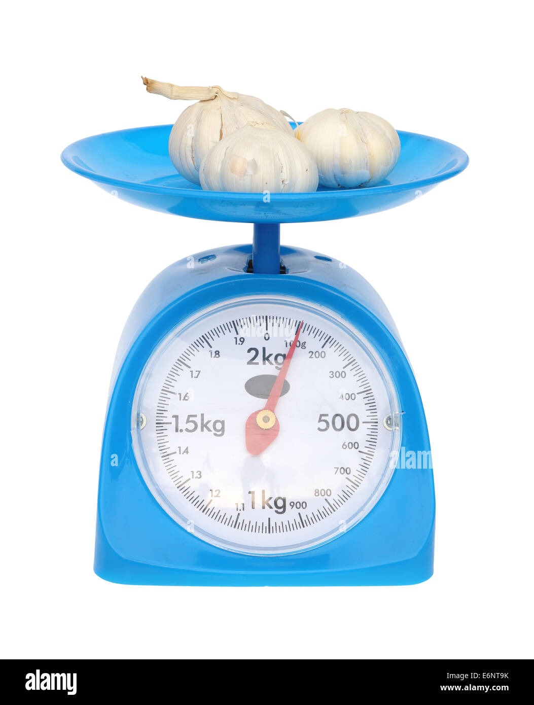kitchen scales and garlic isolated on white background (with clipping ...
