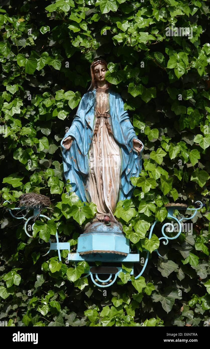 A statue of the Virgin Mary in downtown Antwerp 27.04.2014 Stock Photo ...
