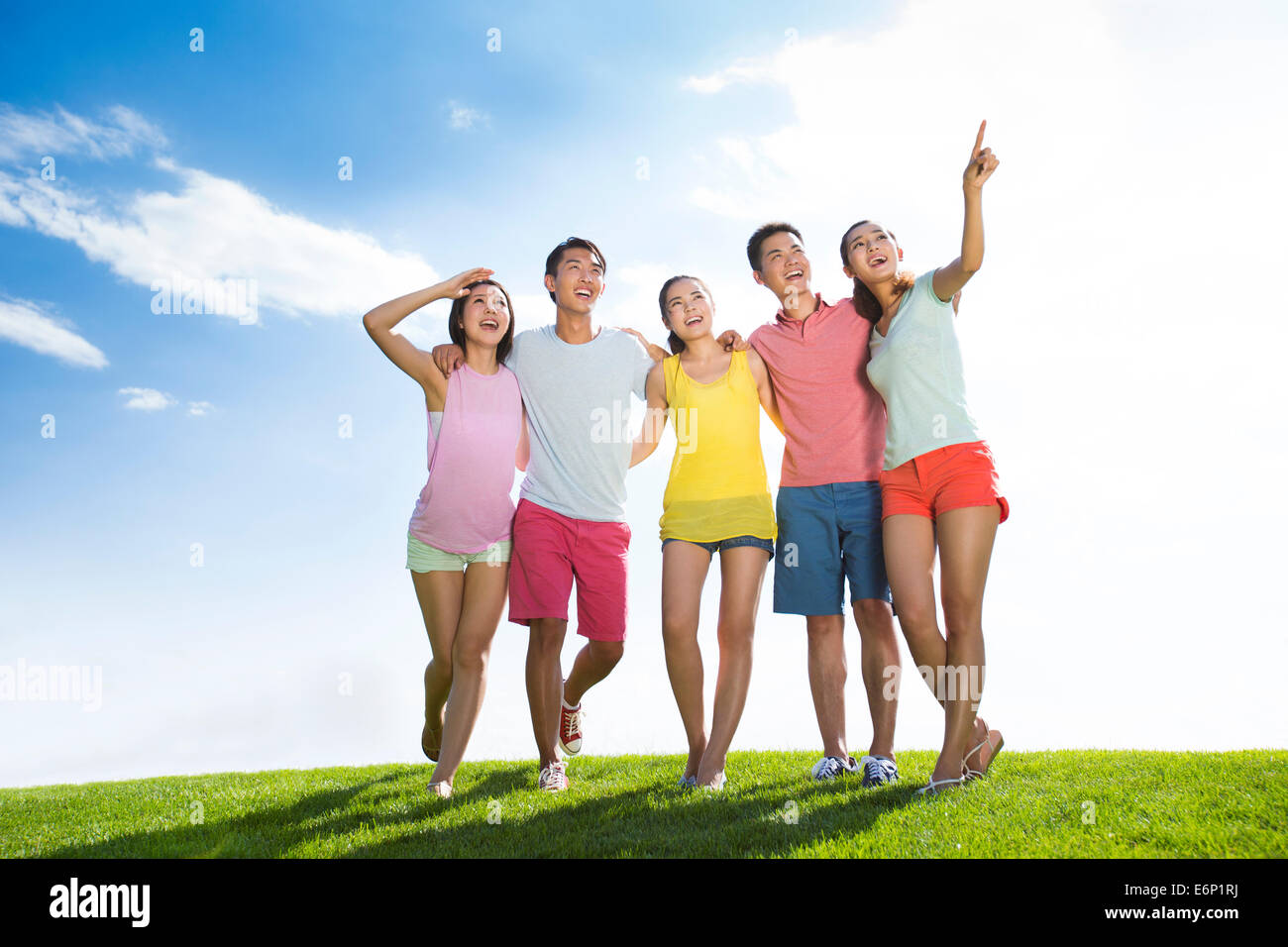 Five adults standing in hi-res stock photography and images - Alamy